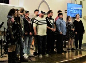 One Eighty ceremony: Grads tell of tragedy and triumph