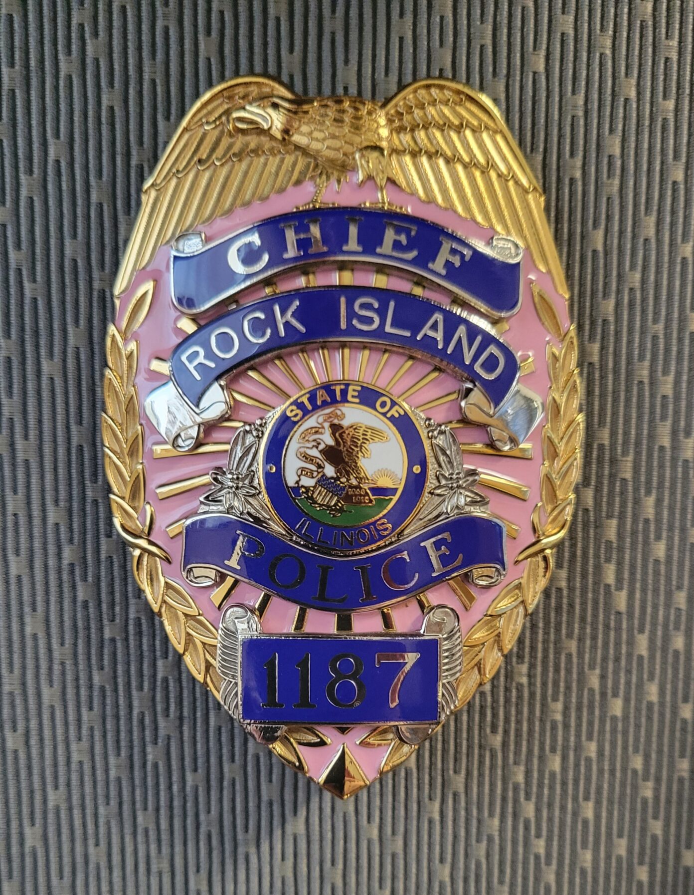 Rock Island police celebrate Pink Badge Month